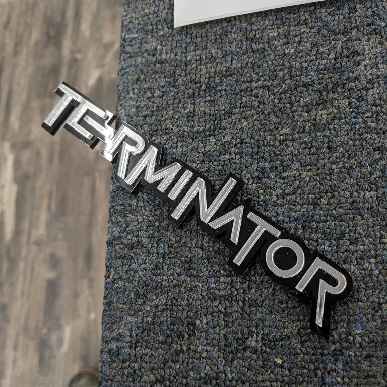 Terminator Car Badge - Mirror Silver On Gloss Black - Squid Font - Tap ...